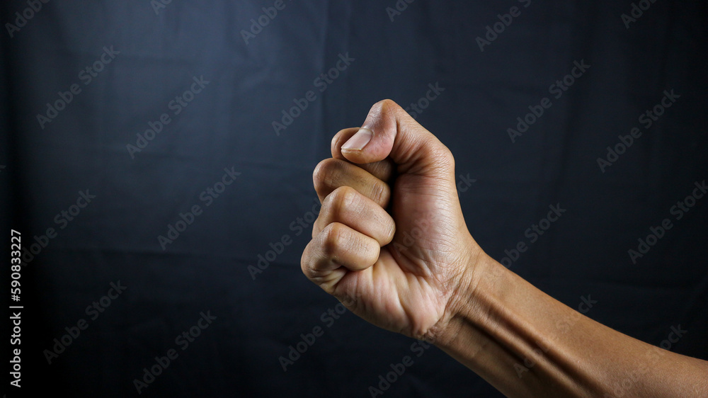 Counting, aggression, brave concept. Black male fist, clenched hand ...
