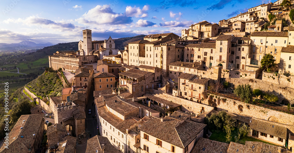 Impressive medieval Assisi town in Umbria over sunset. Italy. aerial ...