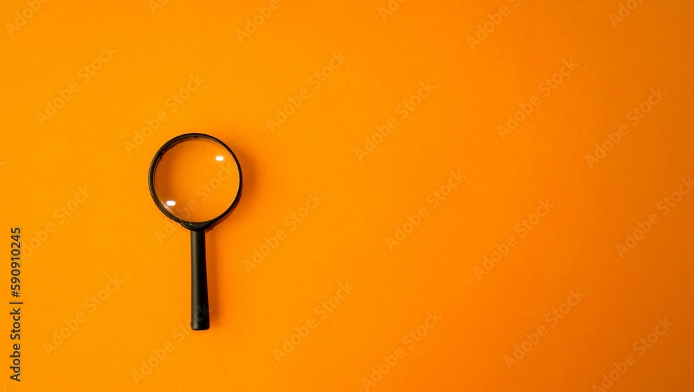 Magnifying glass, magnifier in a black frame on an orange background ...