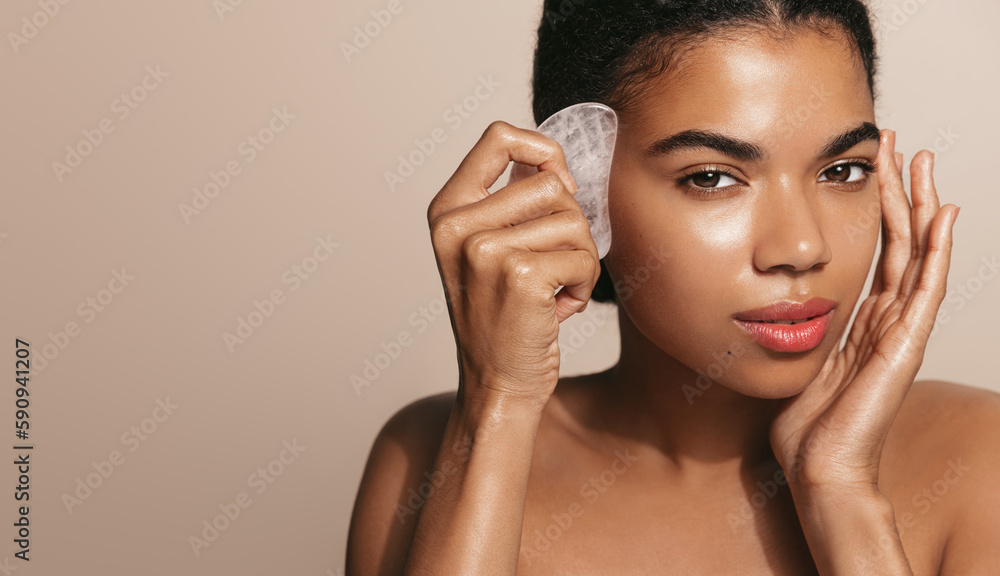 Beauty and skin care. Young 25s Black woman with glowing, shiny facial ...