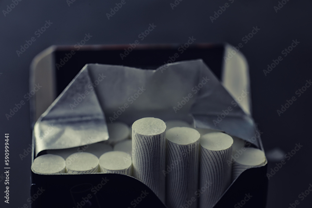 Harmful deadly habit of smoking. Tobacco smoking. Cigarettes in a pack ...