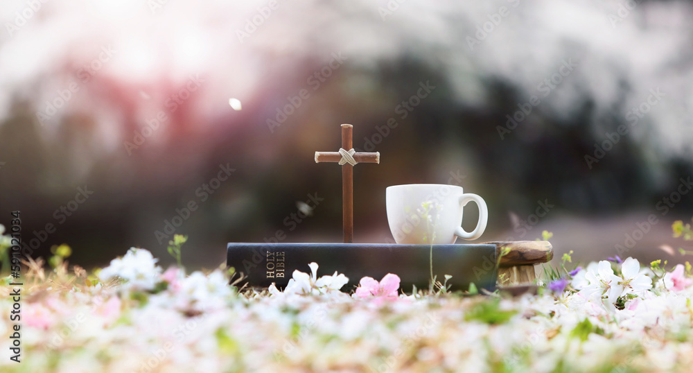 Spring background with the cross of Jesus Christ, the Bible and a ...