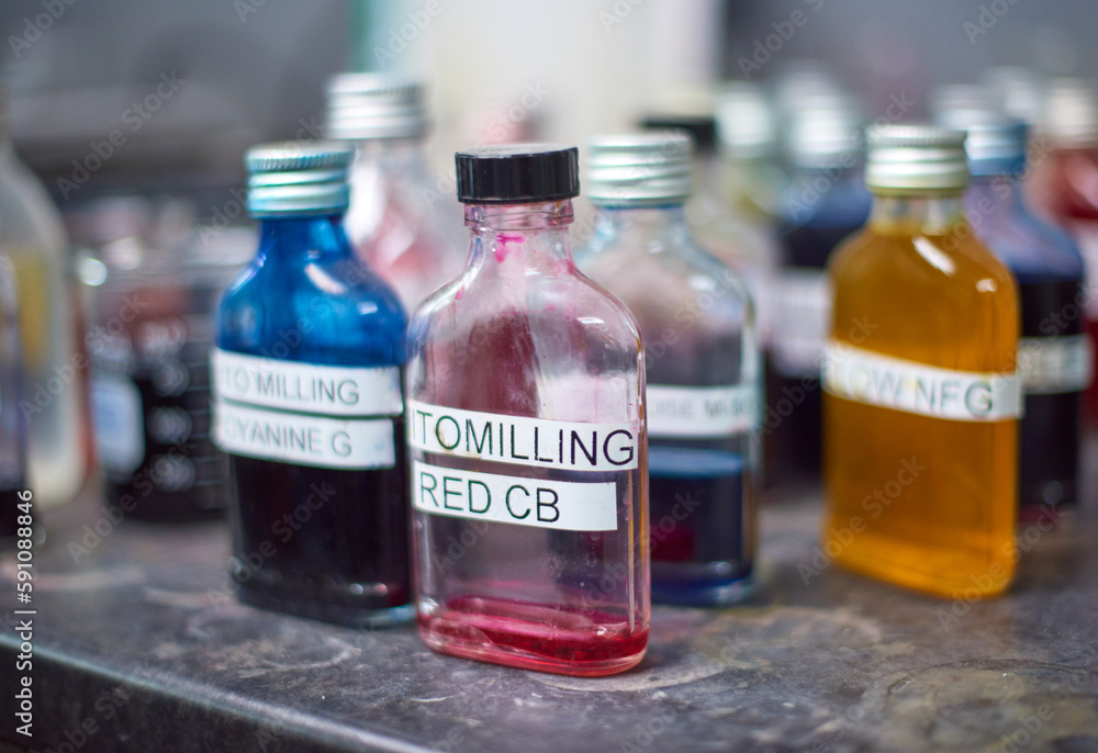 Chemical dye equipment and beakers in a fabric and industrial colouring ...