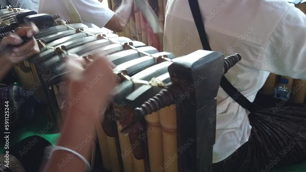 Musician Plays Gamelan Gender Wayang Percussion Instrument from Bali ...