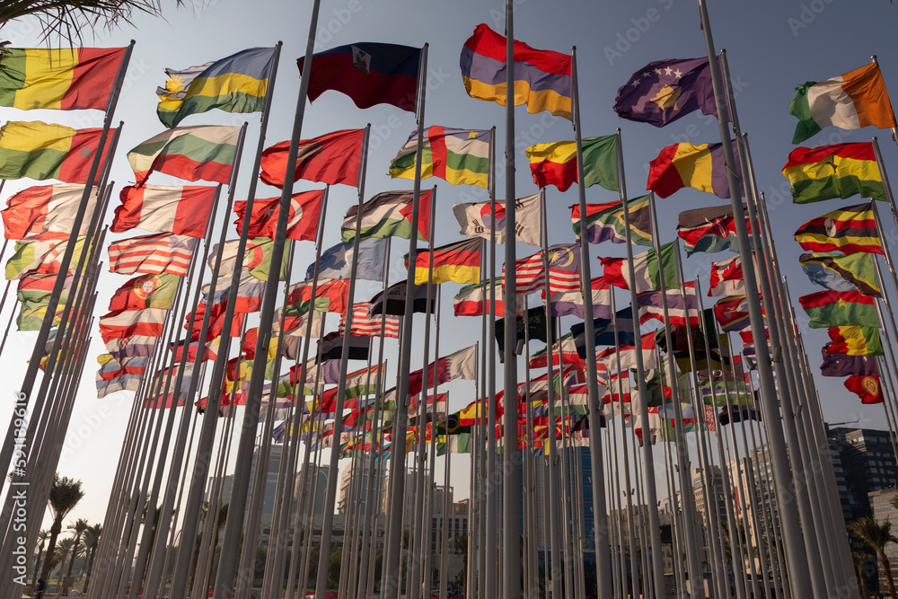 Doha, Qatar - December 12 2022: Flags of countries in the old port of ...