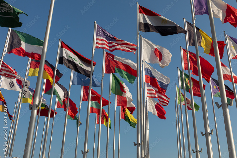 Doha, Qatar - December 12 2022: Flags of countries in the old port of ...