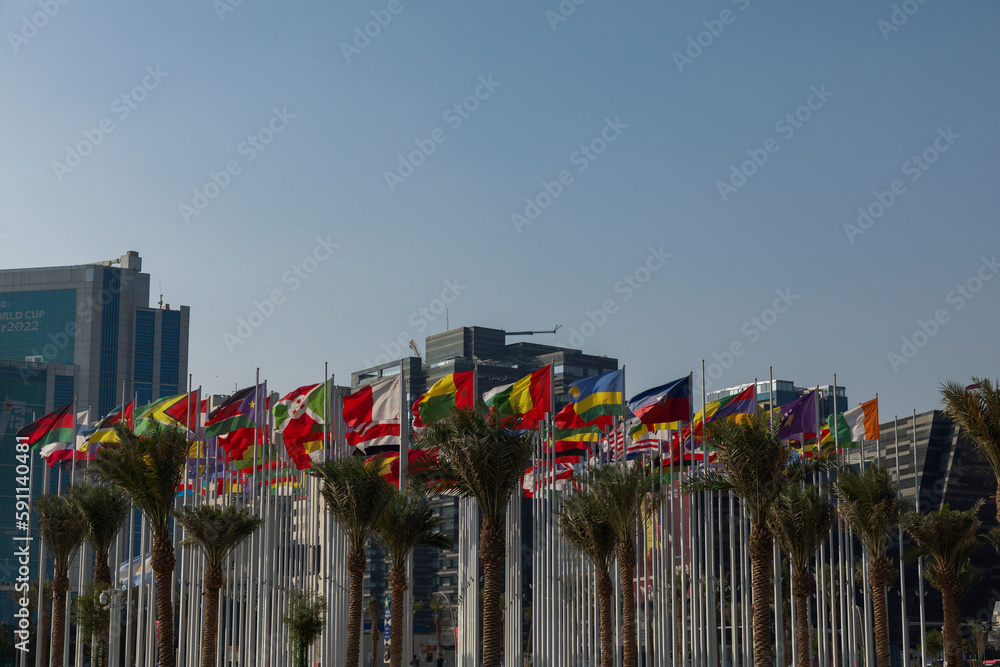 Foto de Doha, Qatar - December 12 2022: Flags of countries in the old ...