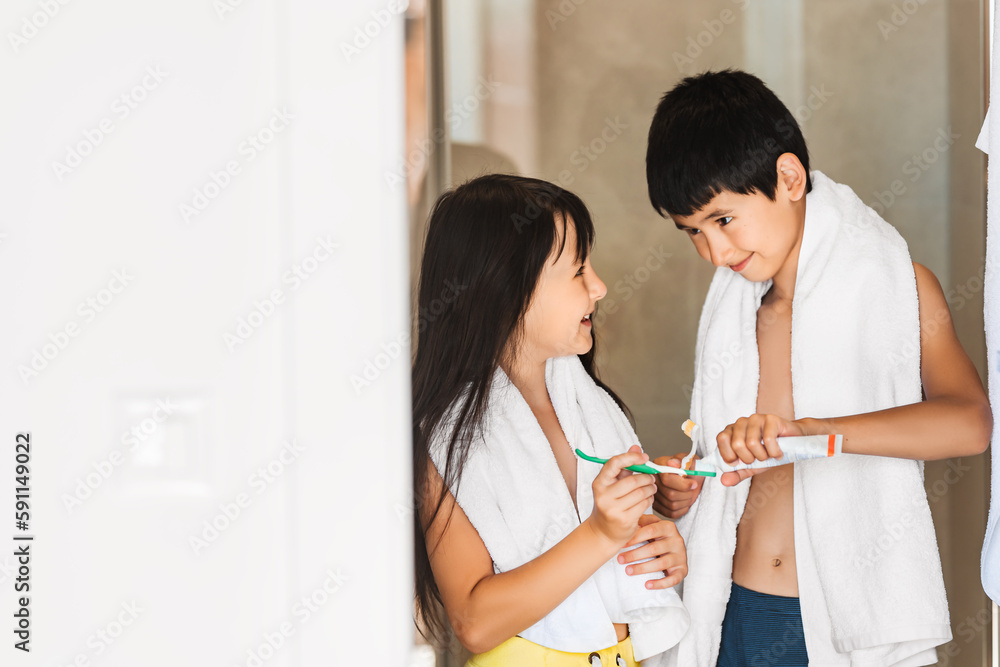 Happy family and health, brother and sister brushing their teeth ...