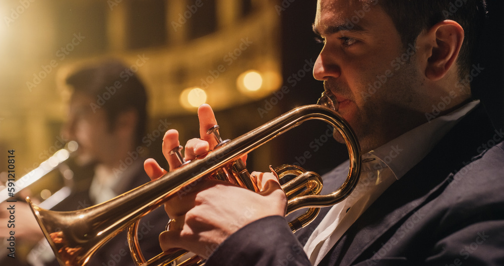 Foto de Cinematic Closeup of a Male Trumpet Player Reading a Music ...
