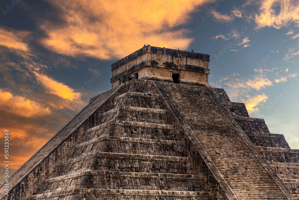 The pyramid of Chichen Itza in honor of the God Kukulkan under a ...