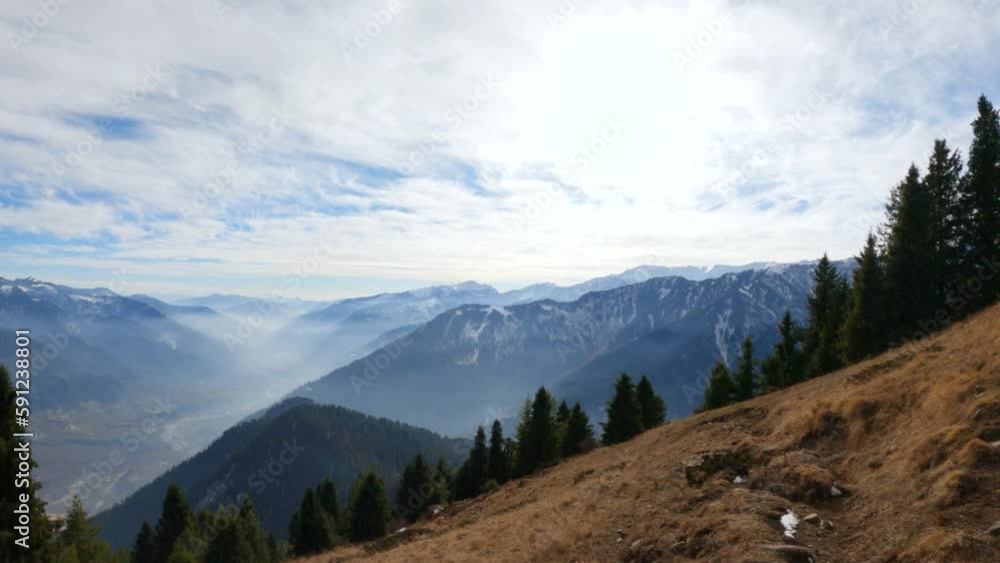 4K shot of Kullu valley during the foggy morning as seen from the top ...