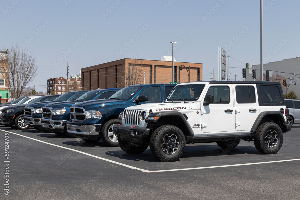 Used car display at a Stellantis dealership. With supply issues ...