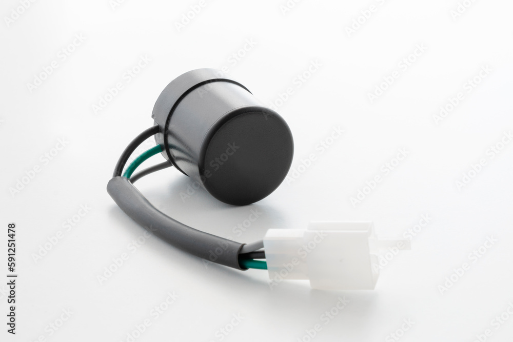 electric motorcycle turn relay 12v, with terminal and wires on a white ...