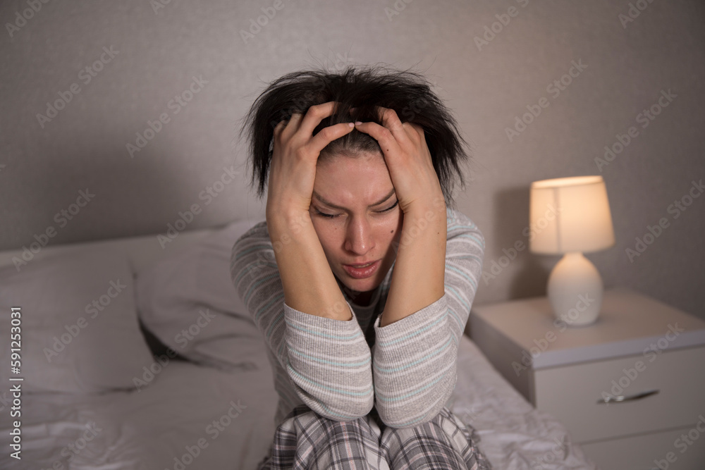Tired frustrated millennial girl touching head, feeling headache ...