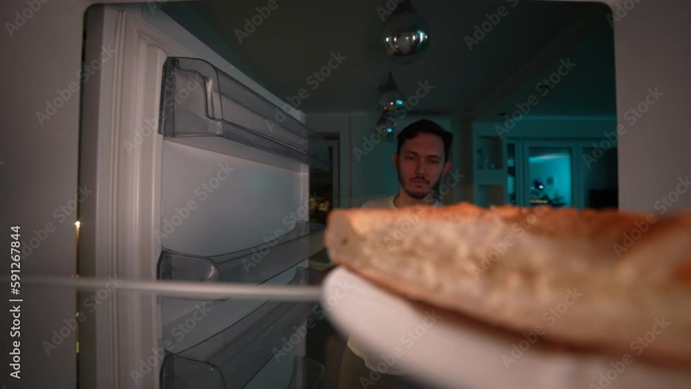 Refrigerator point of view tired freelancer man opening refrigerator ...