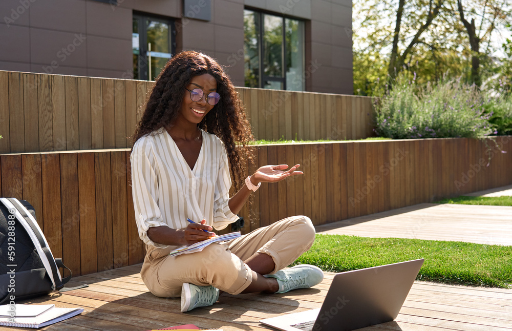 Young happy black African woman university student learning online ...