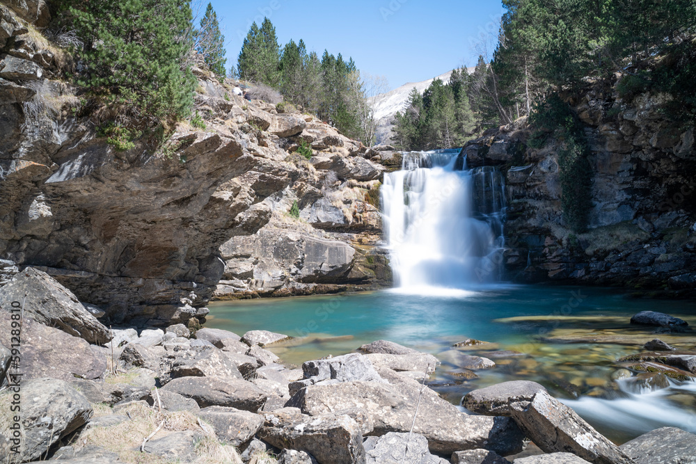 waterfall in the river in Ordesa National Park in the spanish Pyrenees ...