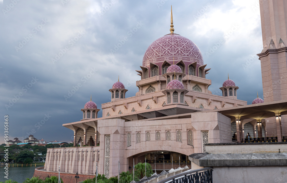 Putrajaya Mosque architecture with red bricks and dark clouds Stock ...