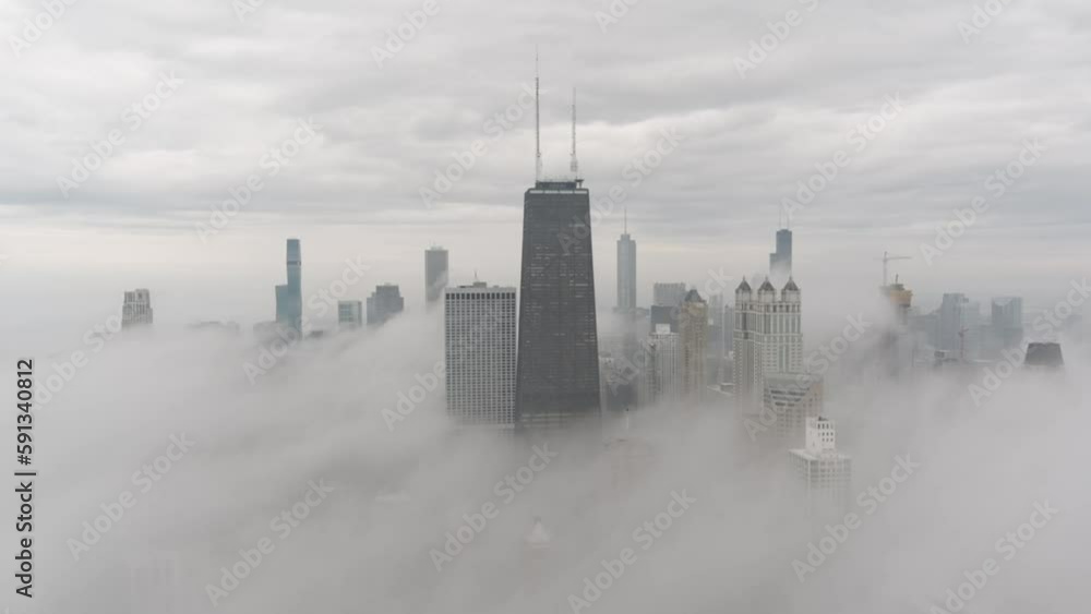 A chicago skyline consist of misty clouds. Foggy, white, beautiful ...