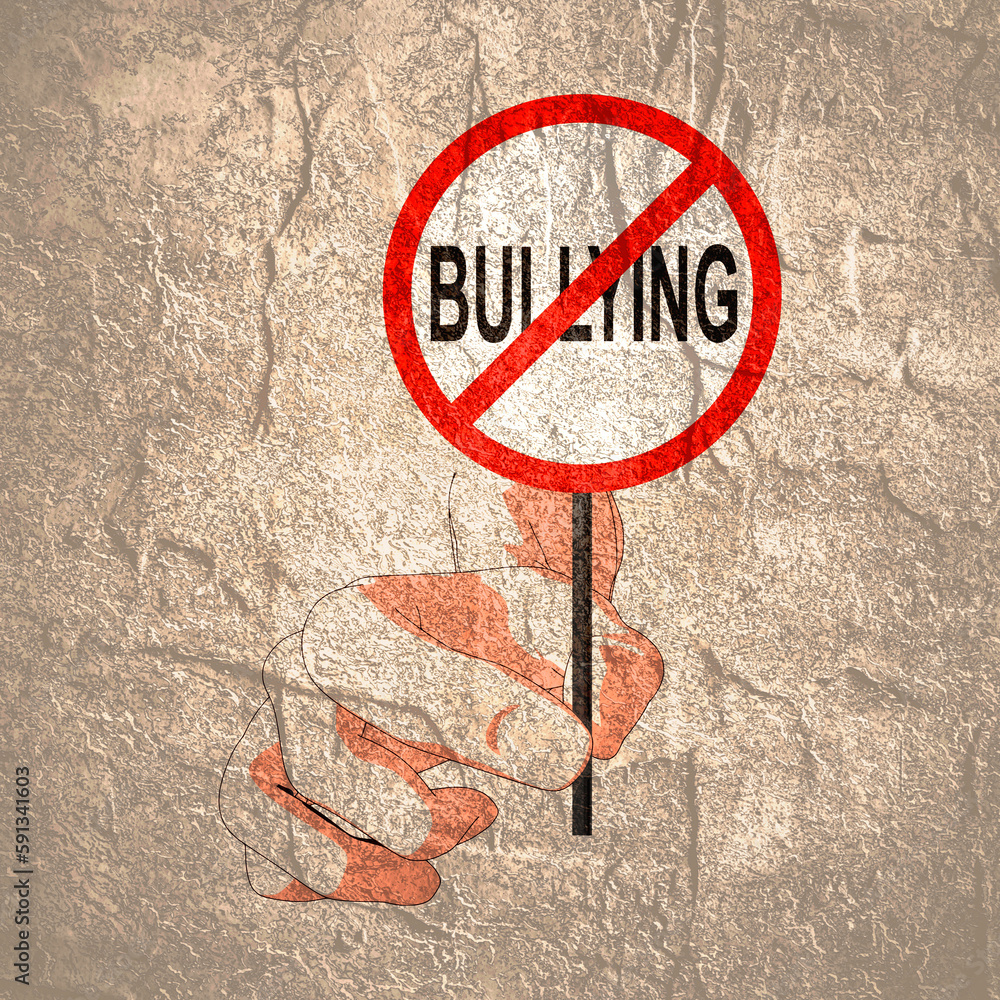 Hand Holding Stop Bullying Road Sign. Stop Bullying and Child Abuse in ...