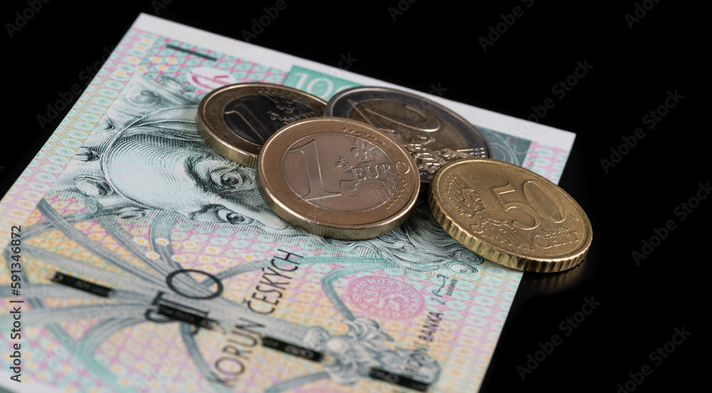 Foto de 100 CZK banknote and 1 and 2 Euro coins do Stock | Adobe Stock