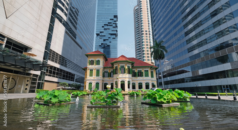 Iconic colonial mansion The House on Sathorn surrounded by modern ...