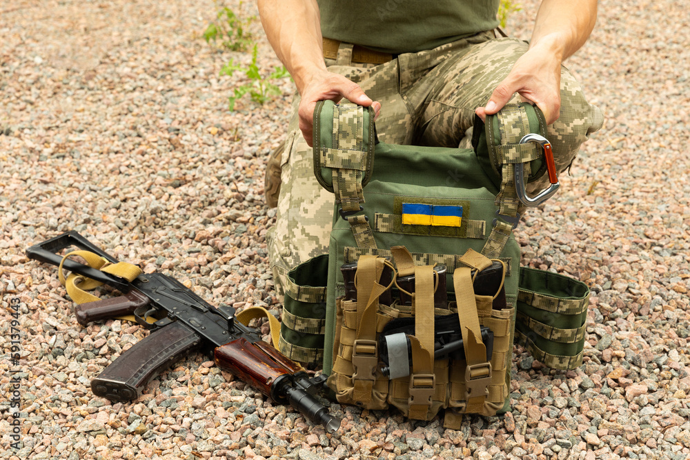Body armor with a Kalashnikov assault rifle. Military concept. Stock ...