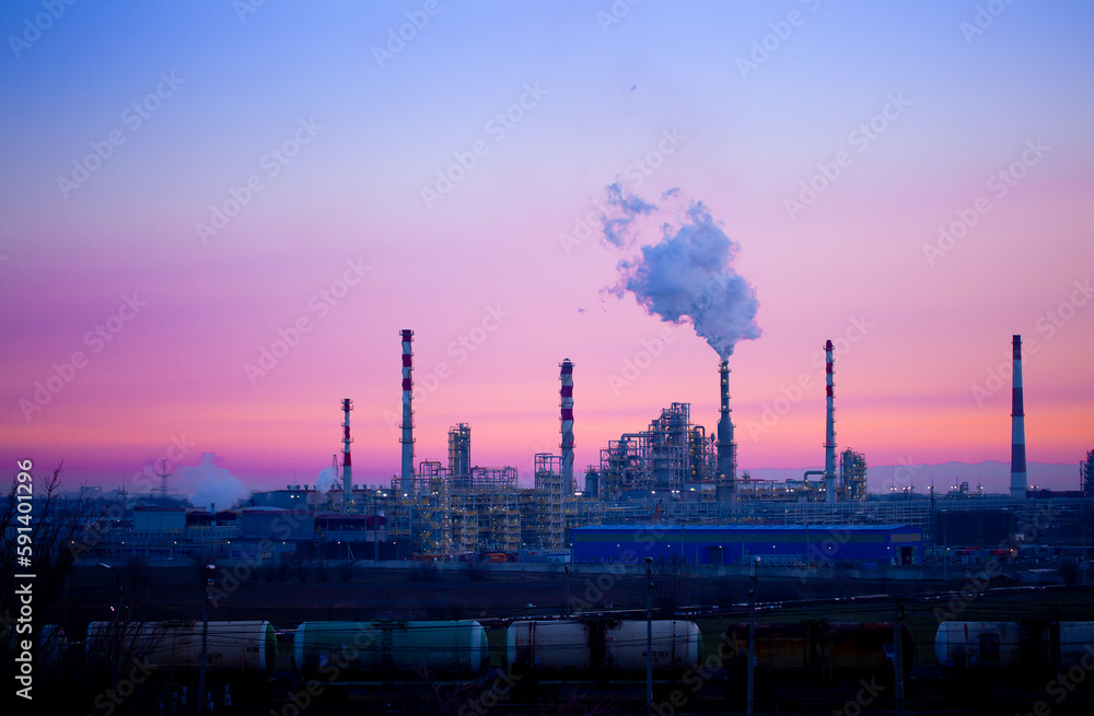 Working oil refinery. Smoke from the factory chimney. Ecological ...