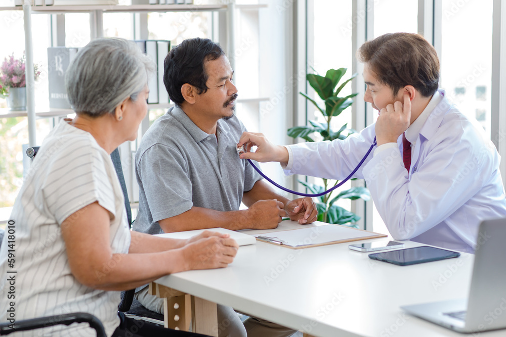 Asian professional successful male doctor in white lab coat with ...