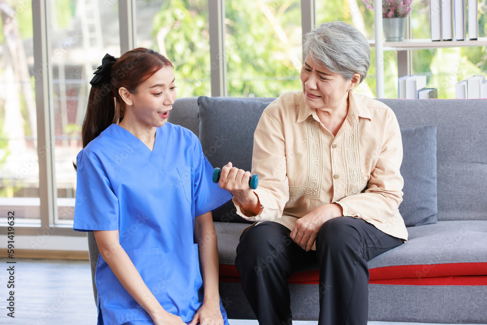 Asian professional successful female internship nurse in blue uniform ...