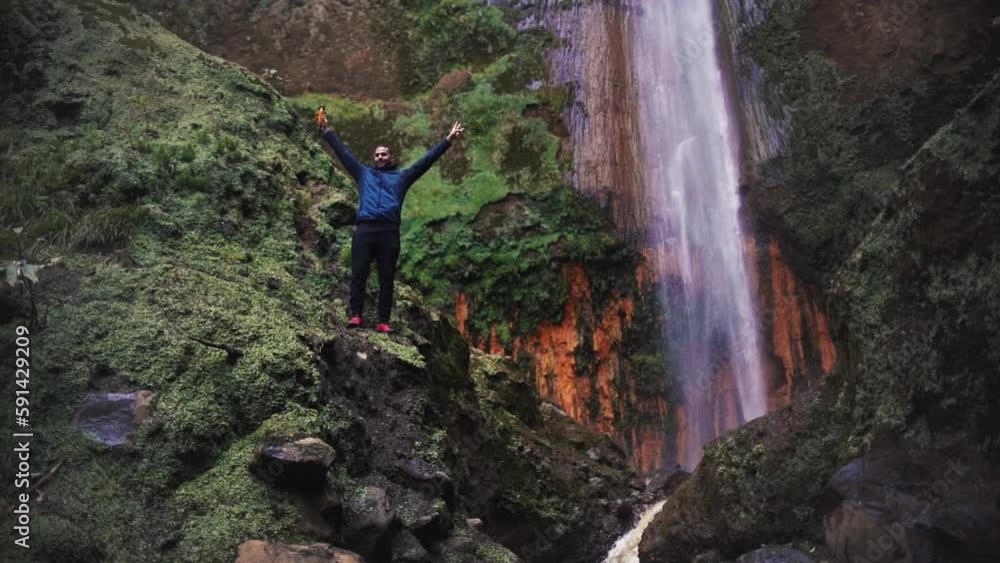 Waterfall in Sao Miguel, Azores. Track of water fall amidst beautiful ...