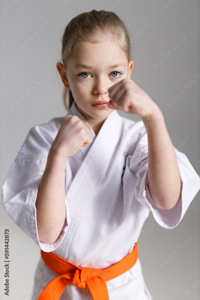 Defensive position in karate, child girl in training. Stock Photo ...