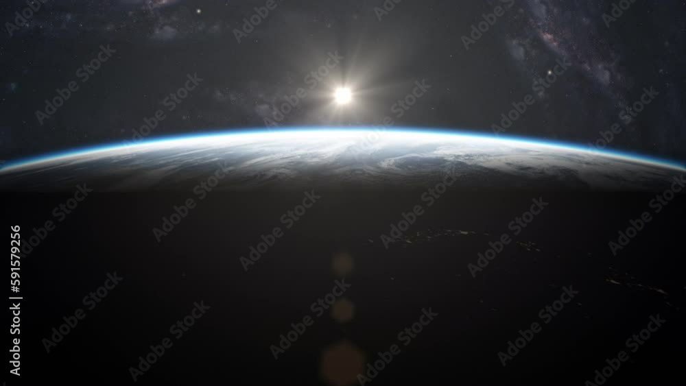 sun rising over planet earth seen from space,camera flying low over the ...