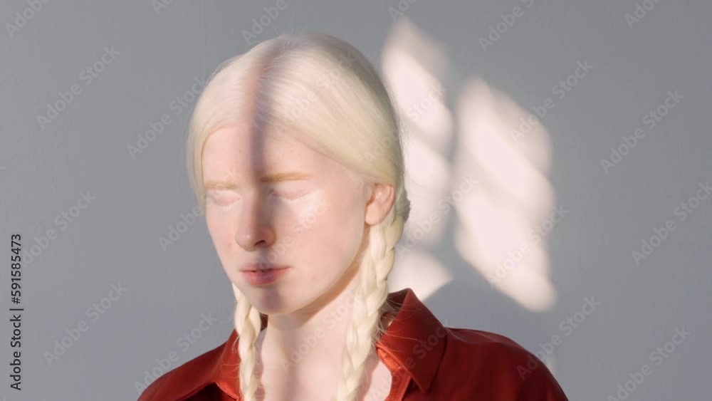 Beautiful albino teen girl, cute pretty model with braids wearing red ...