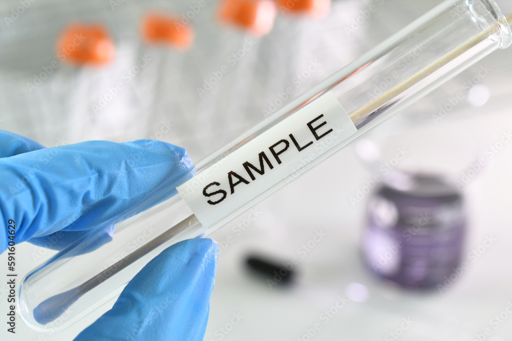 Testing swab being inserted test tube labeled sample Stock Photo ...