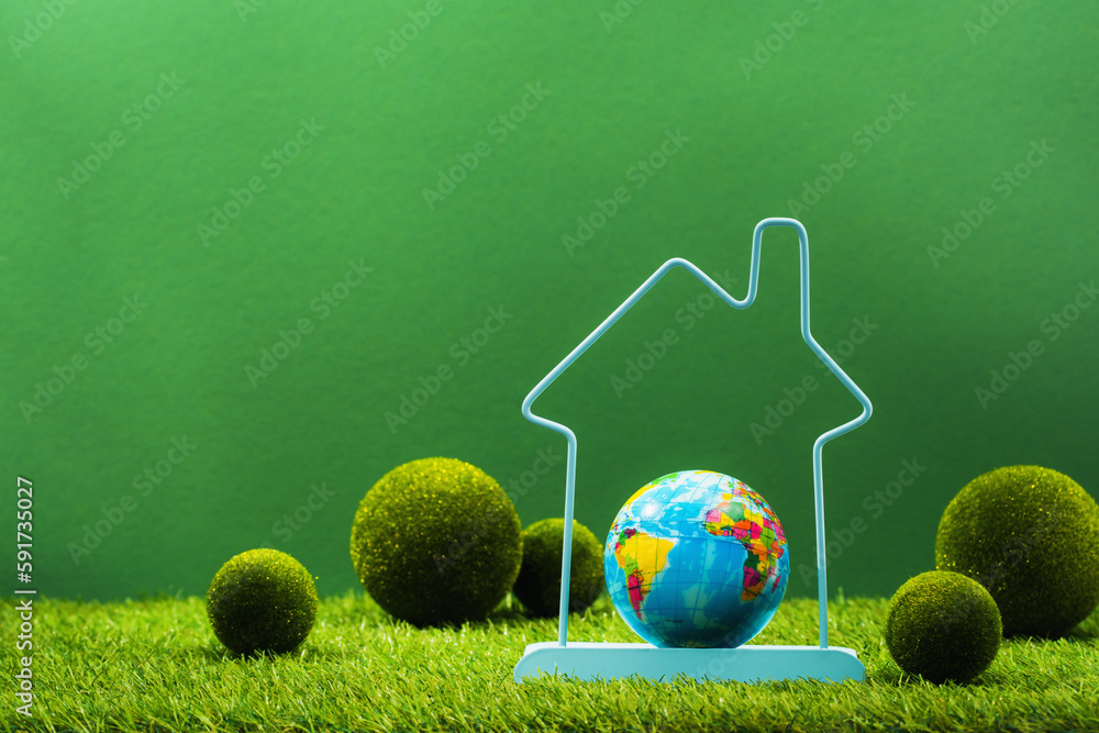Earth Day. Earth globe in house frame in green background. Environment ...