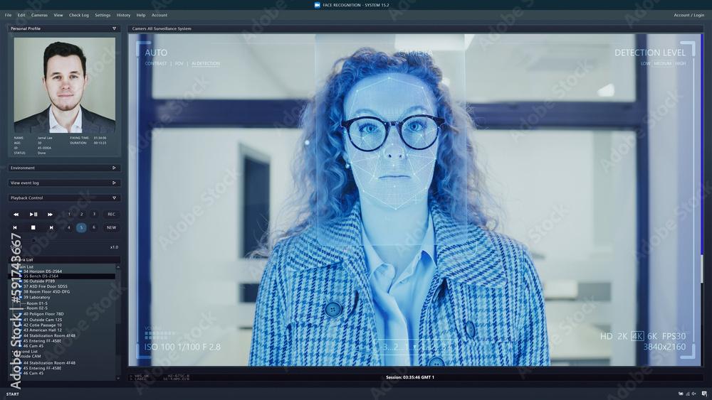 Adult woman scans face in coworking office. Security system software ...