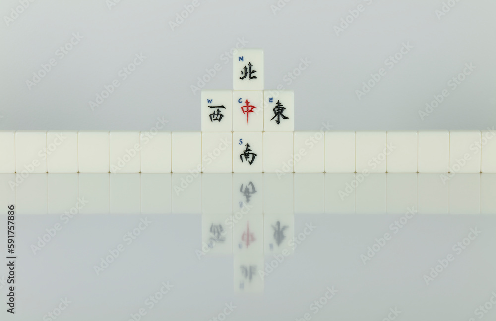 Still life of mahjong tiles with Chinese characters Dong(east), Nan ...