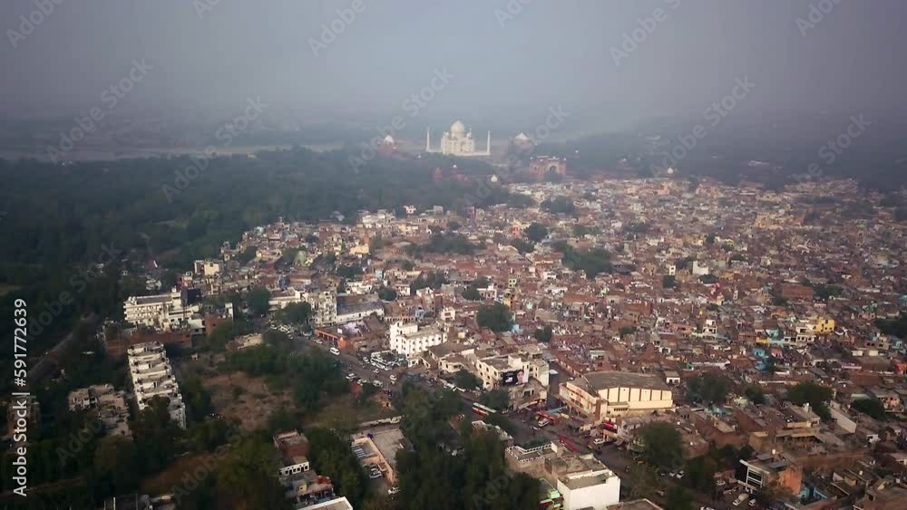 Famous Taj Mahal from afar distance aerial Arga India rural busy city ...