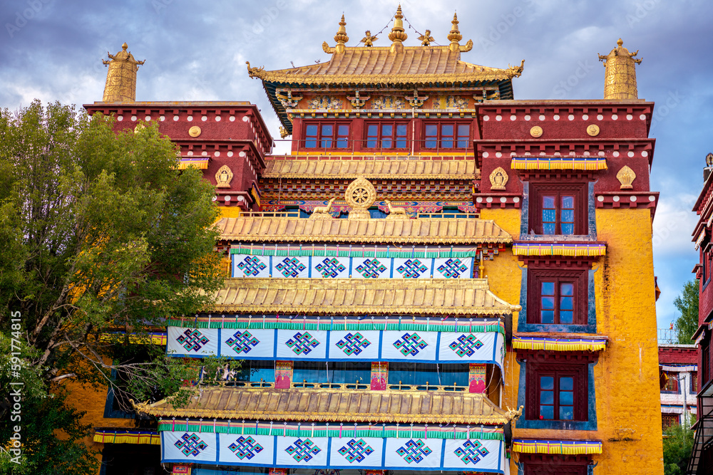 The facade of the beautiful buddhist monastery of Litang, also known as ...