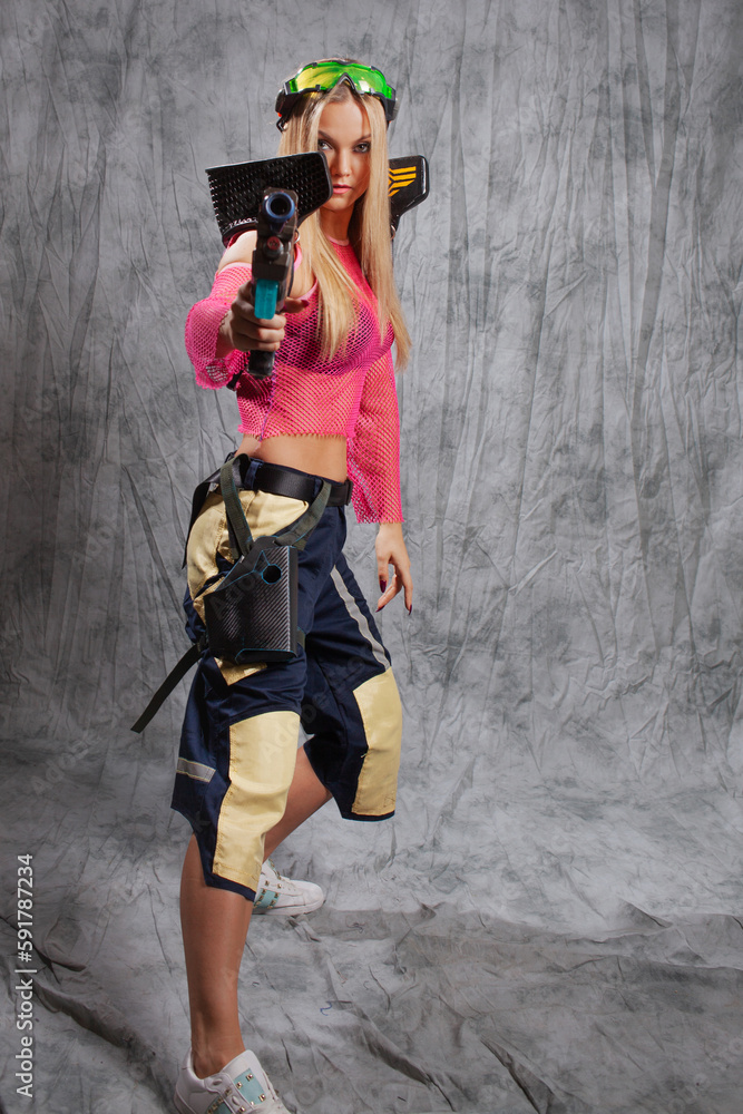 Cyber thug with a laser gun, a bold and bright blonde in a futuristic ...