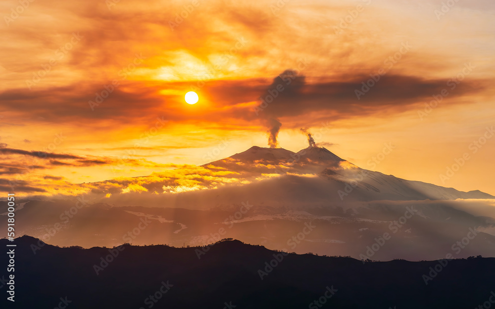 mysterious landscape of great erupting volcano with smoke from craters ...
