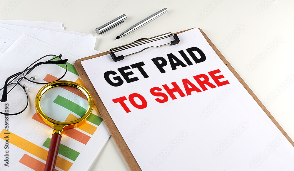 GET PAID TO SHARE text on clipboard with chart on white background ...