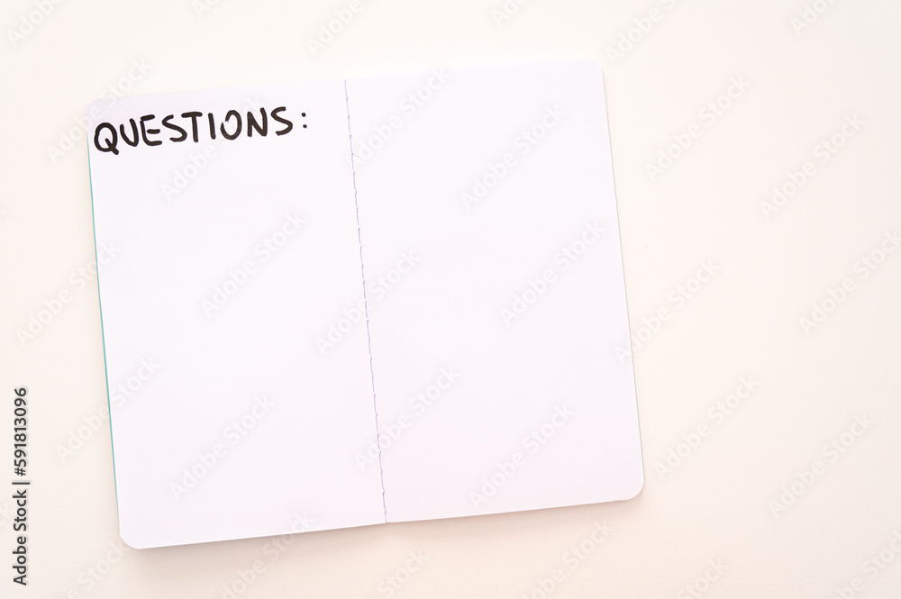 Foto de Blank notebook page, with the writing Questions, and marker ...
