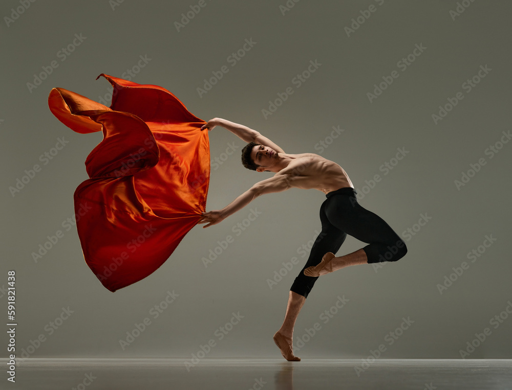 Young, artistic, handsome man, ballet dancer making performance with ...