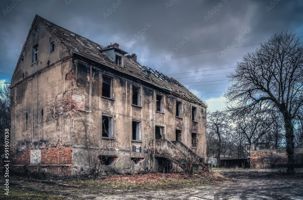 Old ruined building in a dark scenery. Left collapsing house, the ...
