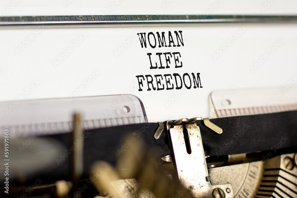 Woman life freedom symbol. Concept words Woman Life Freedom typed on an ...