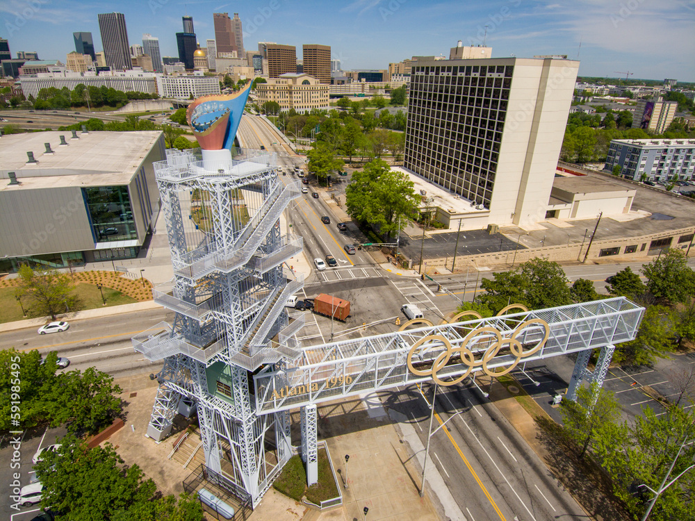 aerial shot of the Atlanta Olympic Cauldron Tower surrounded by lush ...
