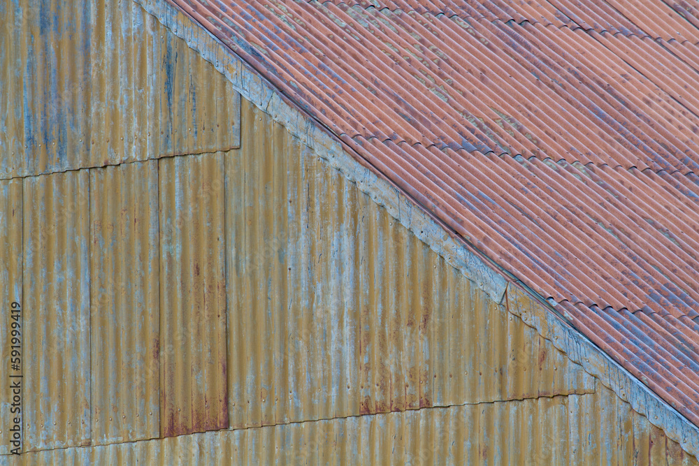 Rusty corrugated metal building at the abandoned Stromness whaling ...