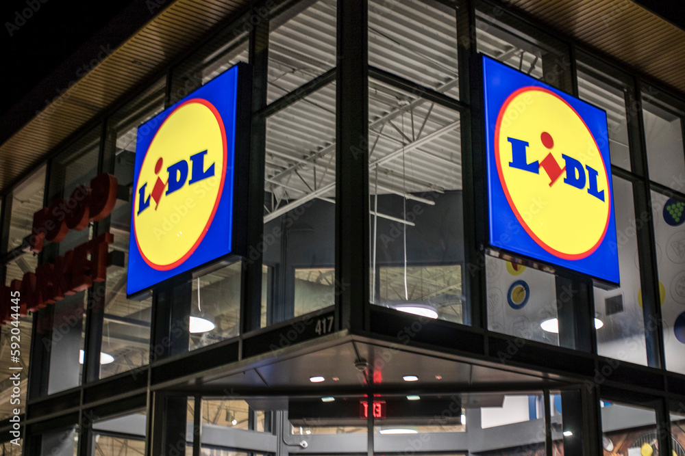 LIDL Grocery Supermarket at night two lighted logo signs at the ...